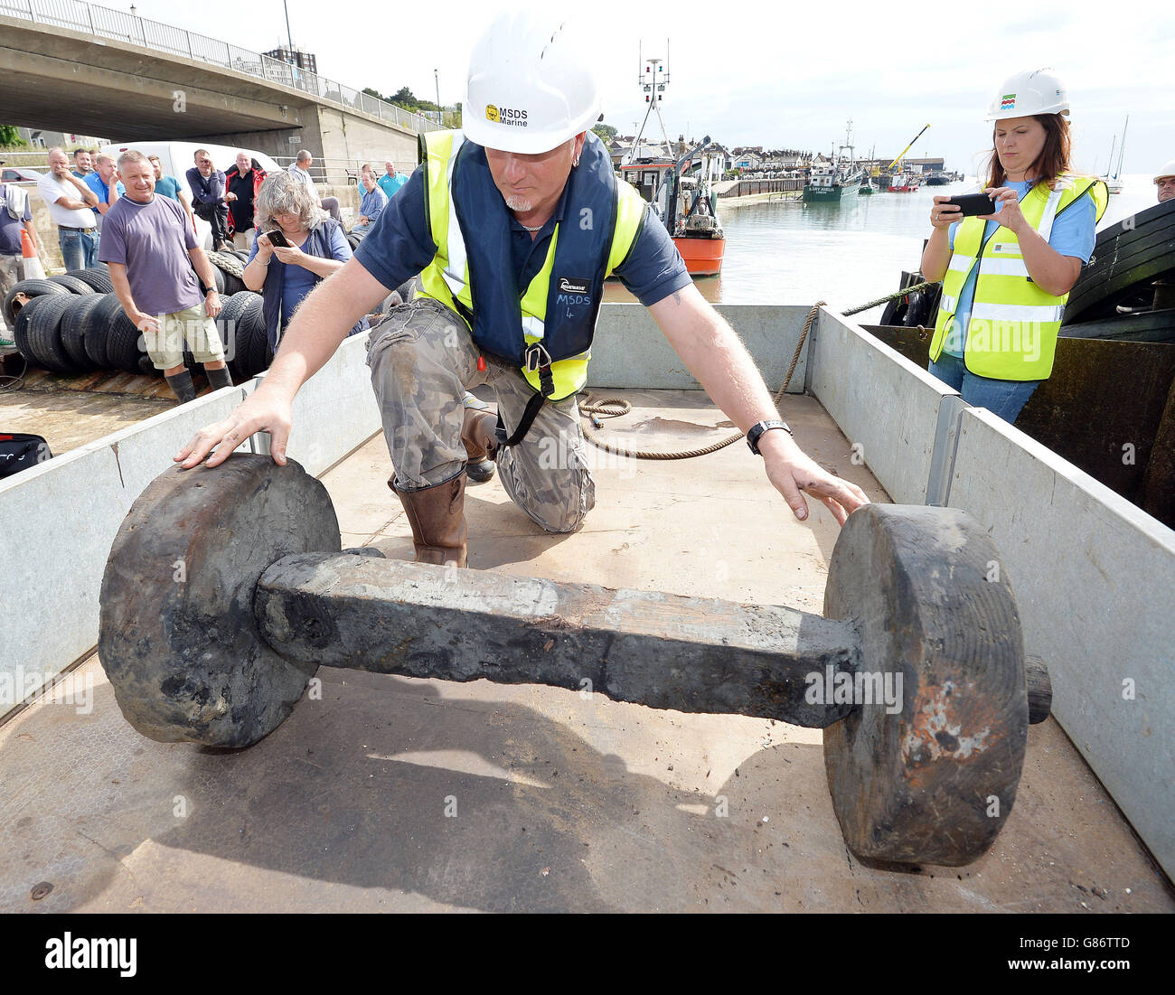 Mark Hobbs of the dive team pushes the wheels from of the 350-year-old ...