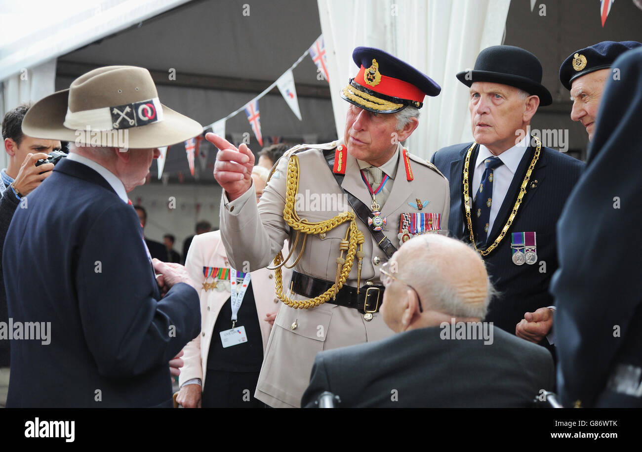 The Prince of Wales meets veteran James Fenton (left) during the 70th ...