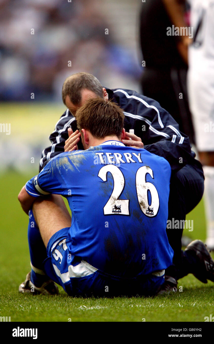 Chelsea's John Terry receives treatment for an head injury after a ...