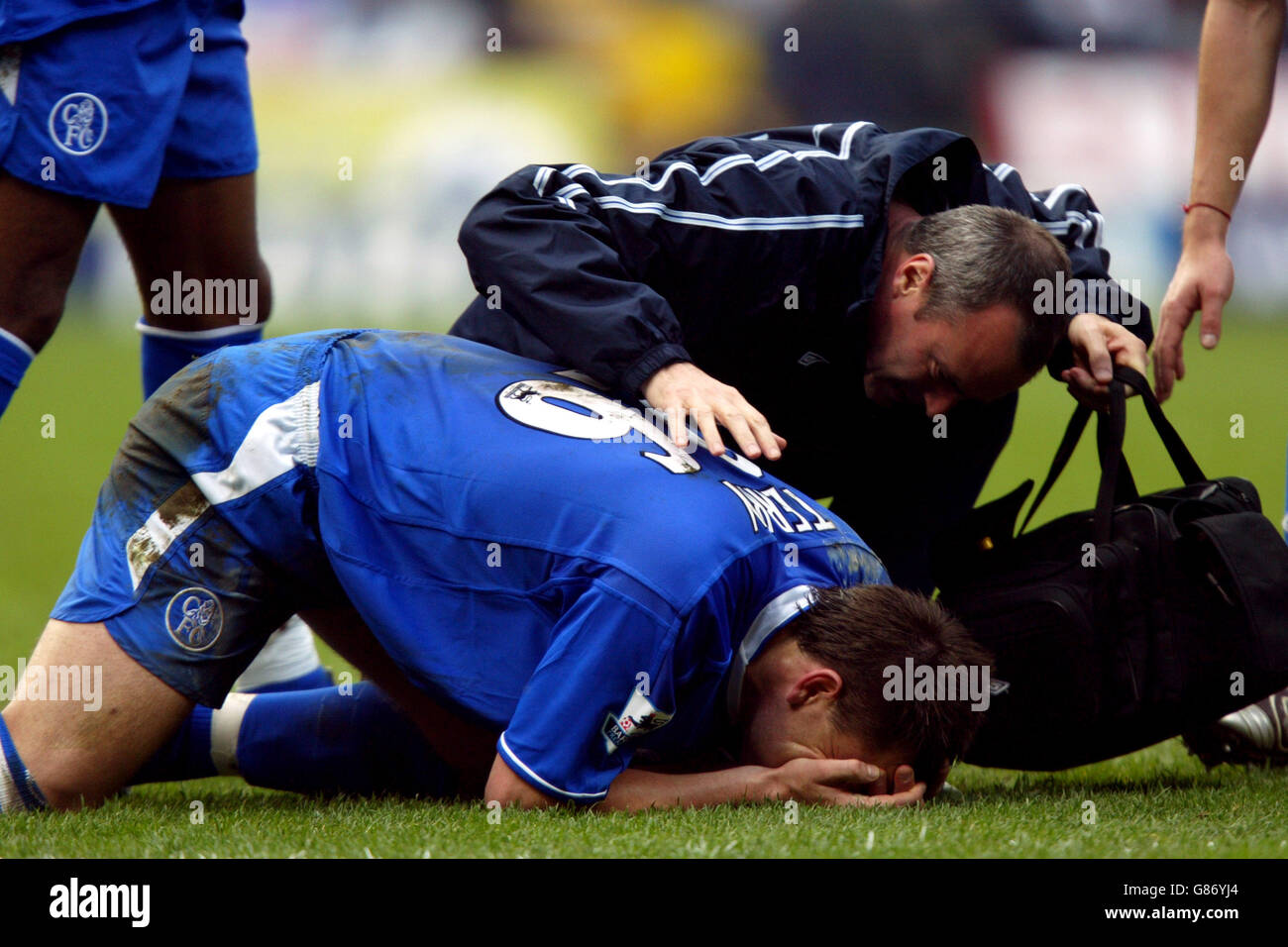 Chelsea's John Terry receives treatment for an head injury after a ...