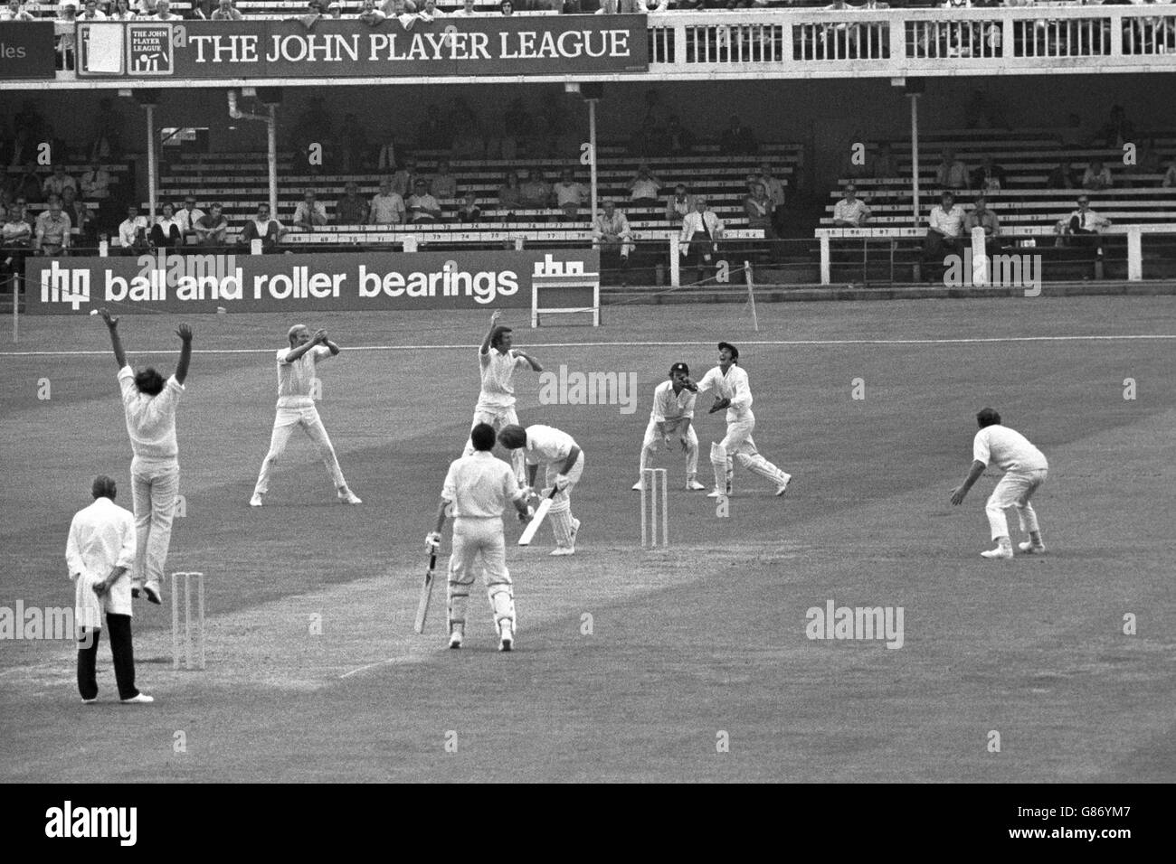 England wicketkeeper Alan Knott (second r) celebrates after catching ...