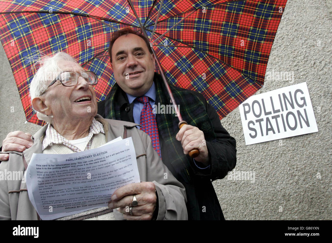 Politics politician old man pensioner voting umbrella hi-res stock ...