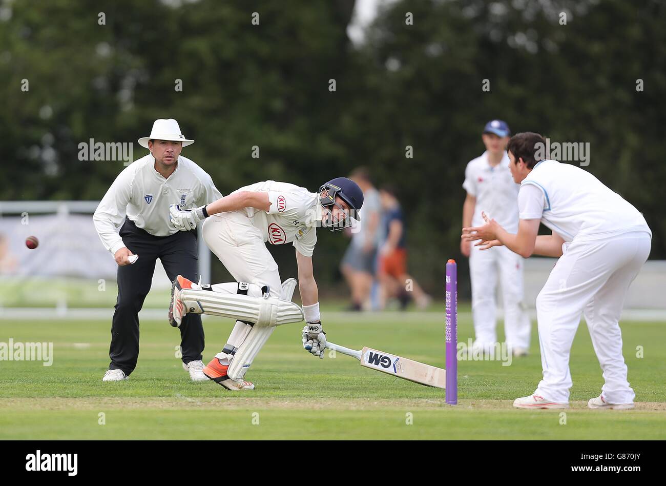 Surrey's batsman avoids being run out by getting to the crease just in ...