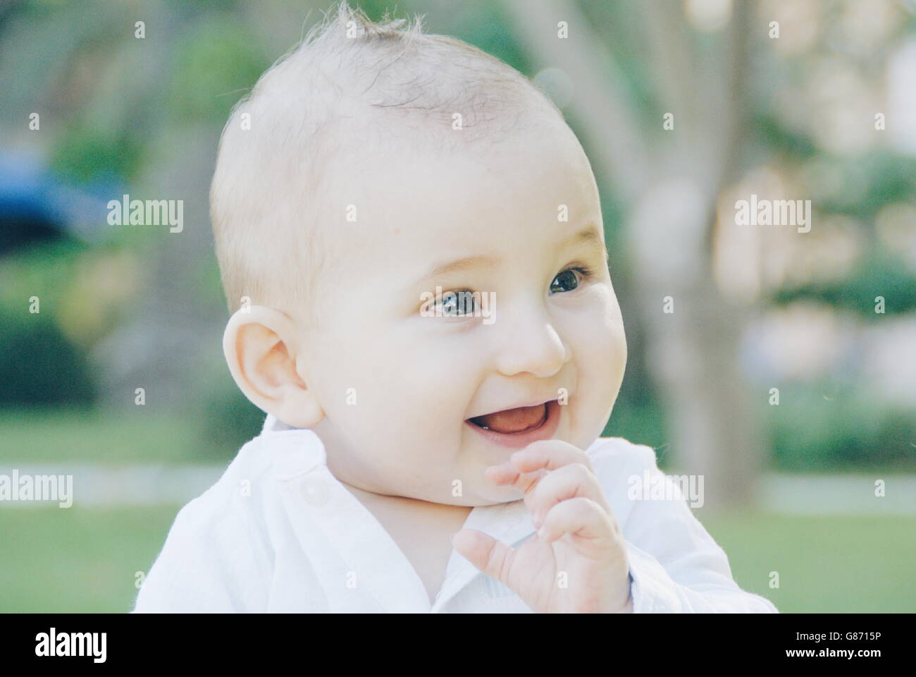 Portrait of a smiling baby boy Stock Photo - Alamy