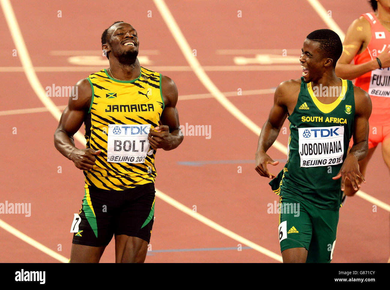 Jamaica's Usain Bolt and South Africa's Anaso Jobodwana in action in ...