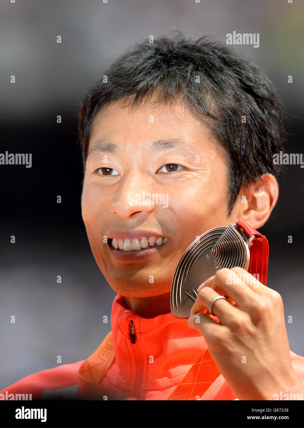 Japan's Takayuki Tanii with his bronze medal after the Men's 50km Race ...