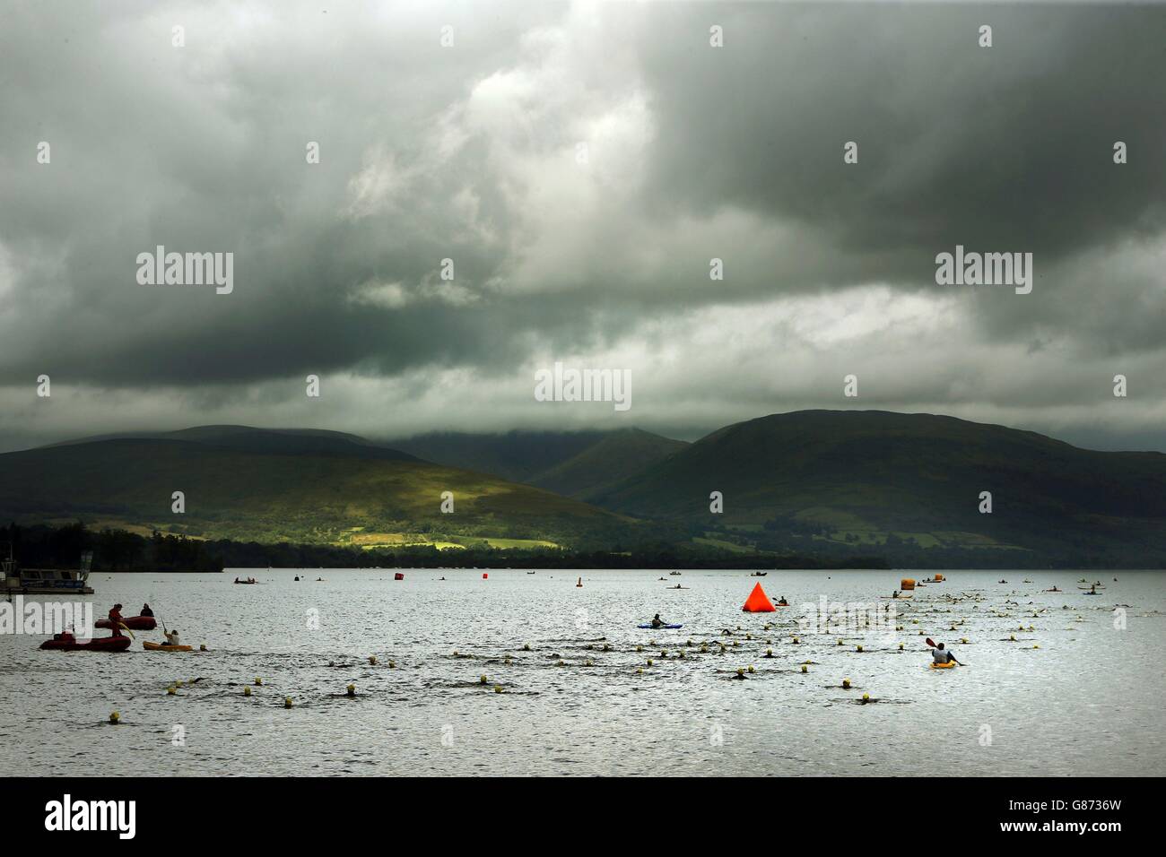 Participants take part in the Great Scottish Swim at Loch Lomond Stock ...