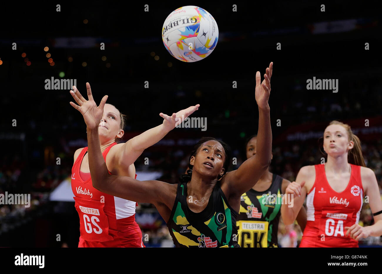 England's Joanne Harten and Jamaica's Stacian Facey compete for the ...