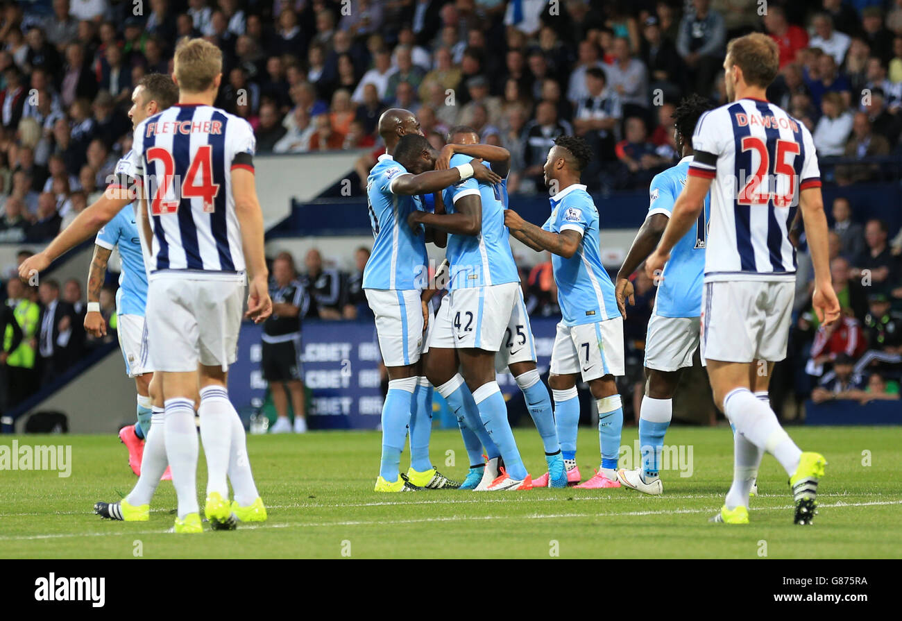 Manchester City's Yaya Toure (No42) celebrates scoring his sides first ...