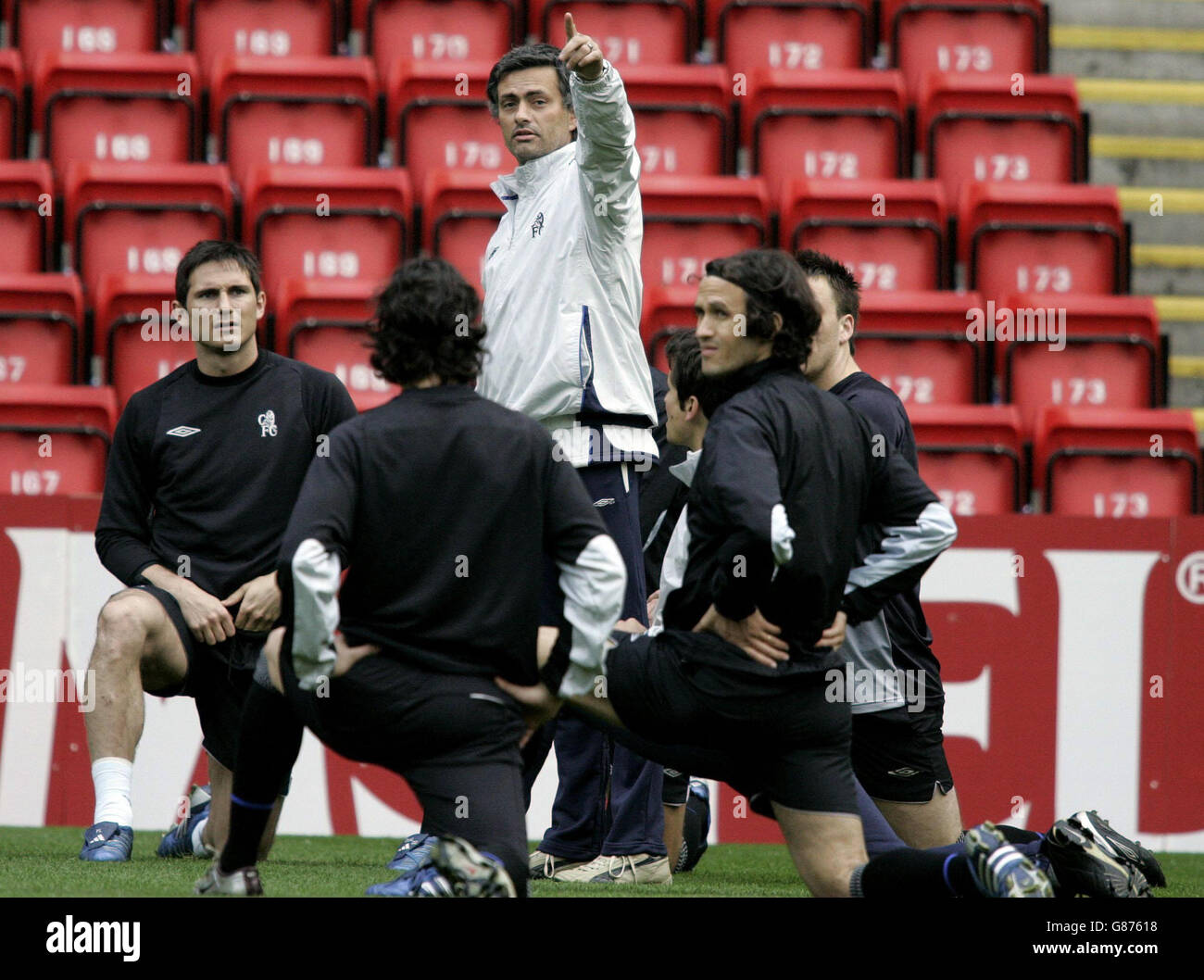 Full length pointing stretching hli hi-res stock photography and images ...