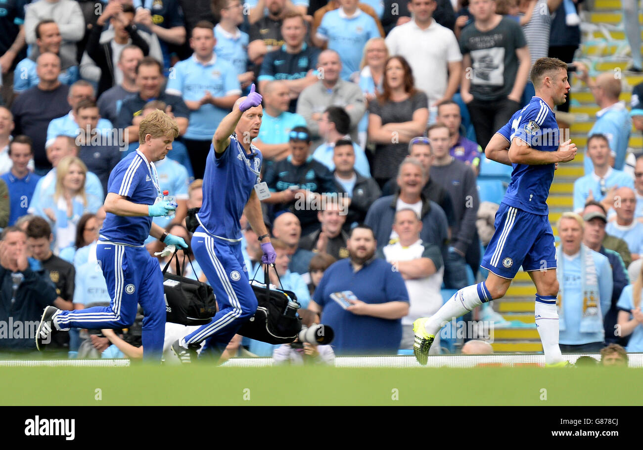 Chelsea doctor Chris Hughes (left), physiotherapist Steven Hughes ...