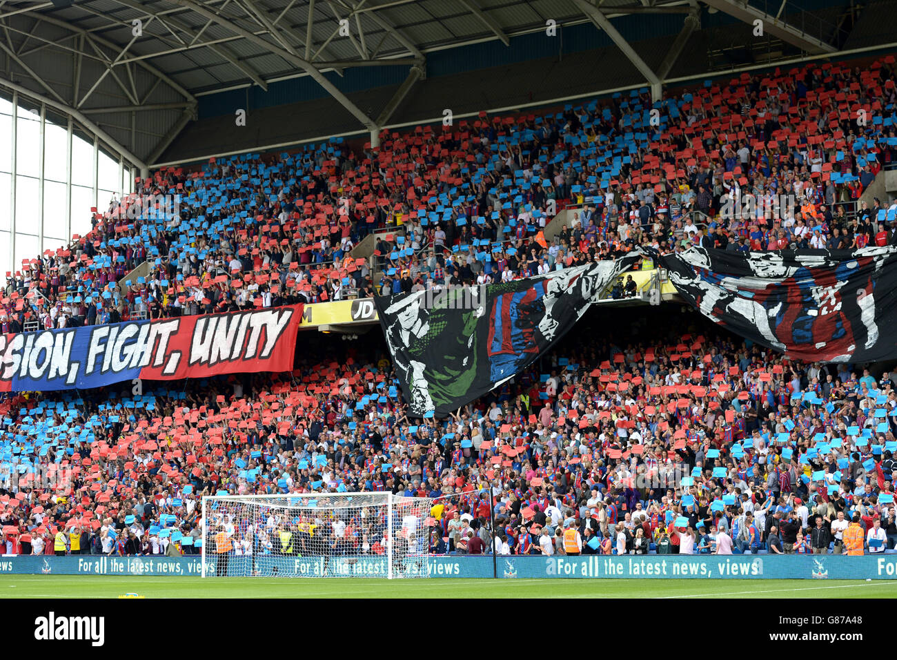 Crystal palace fans hold banners in stands hi-res stock photography and ...