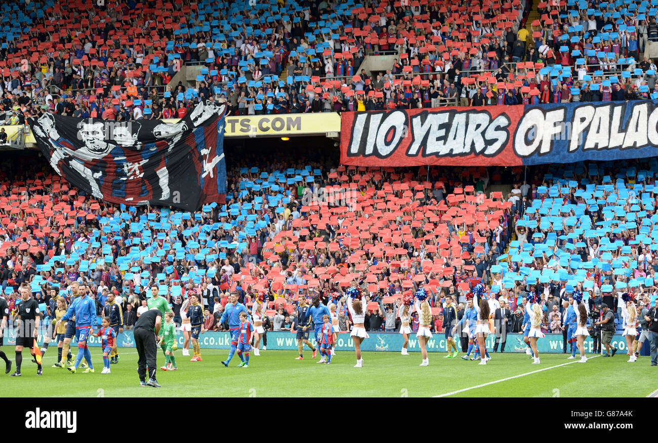 Crystal Palace fans hold a banner in the stands which reads '110 Years ...