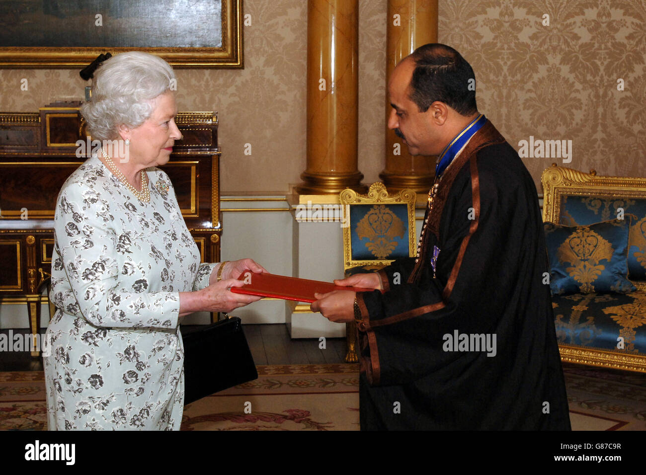 Britain's Queen Elizabeth II shakes hands with His Excellency Mr ...
