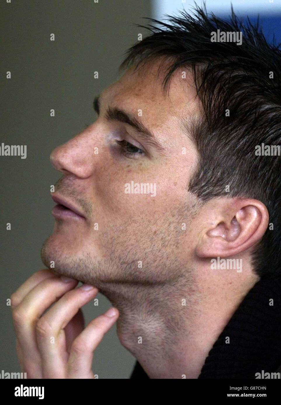 Profile head shot scratching chin hi-res stock photography and images ...