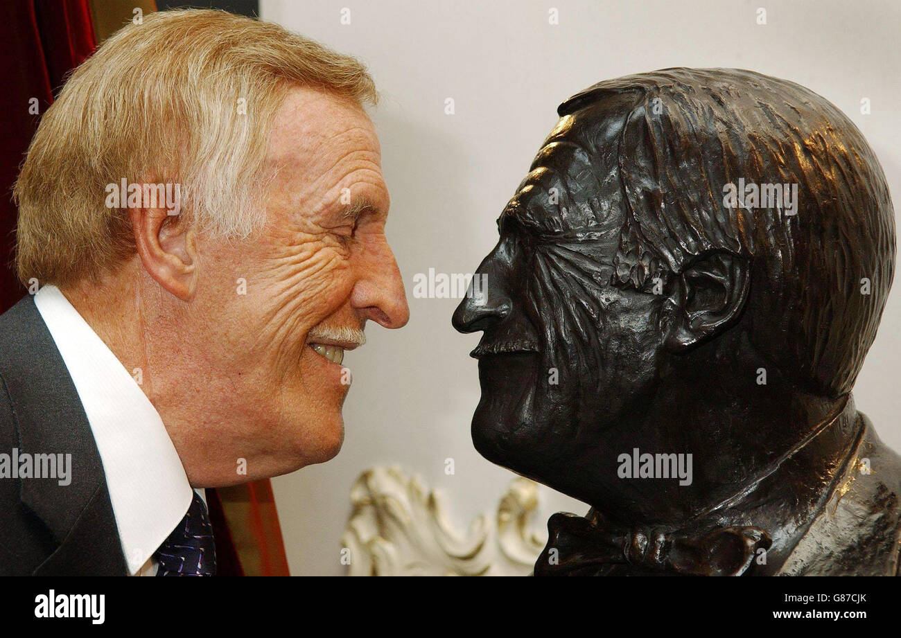 Entertainer Bruce Forsyth with the bust of himself. The bust has been ...