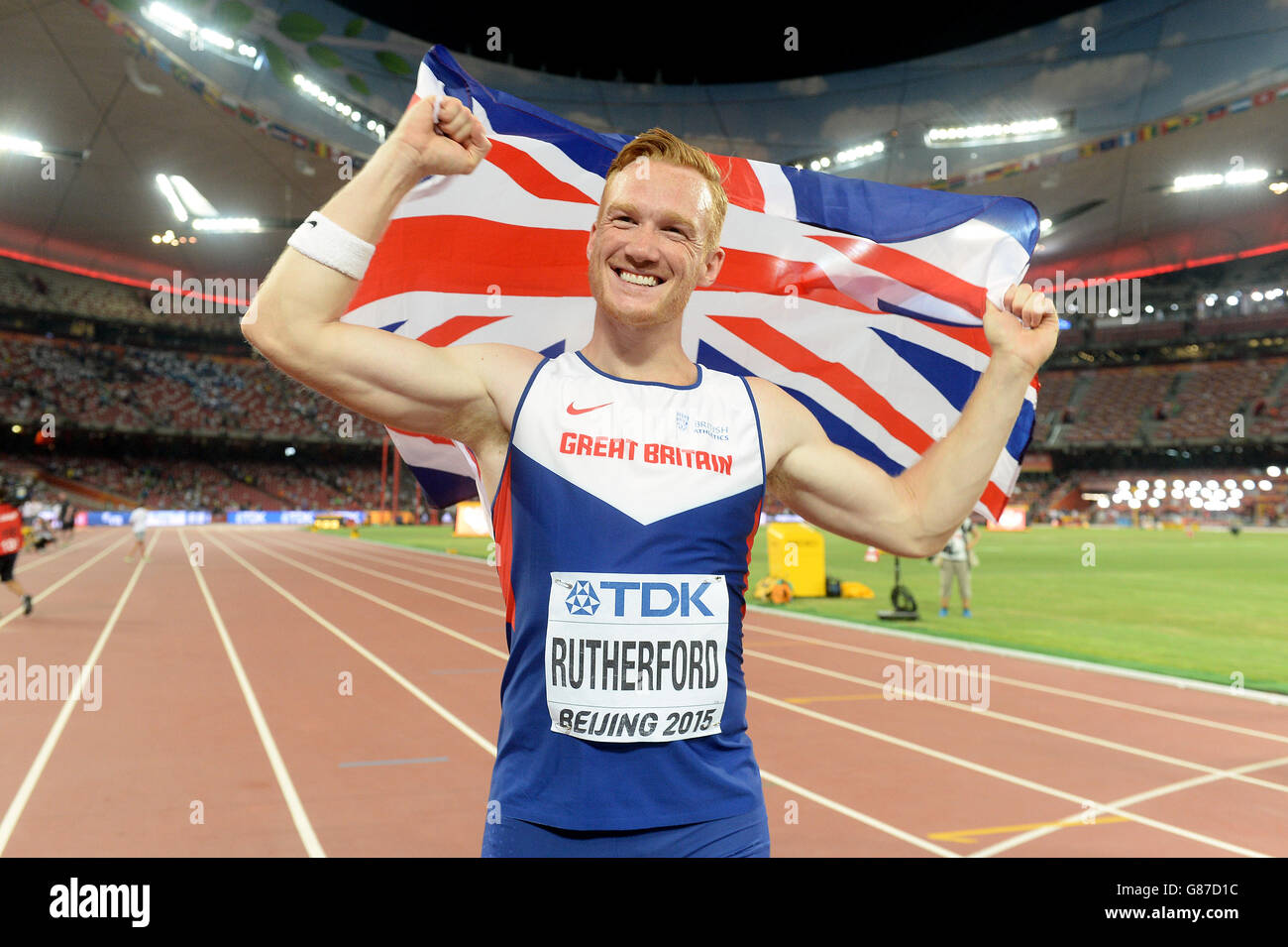 Great Britain's Greg Rutherford celebrates with a Union Jack flag after ...