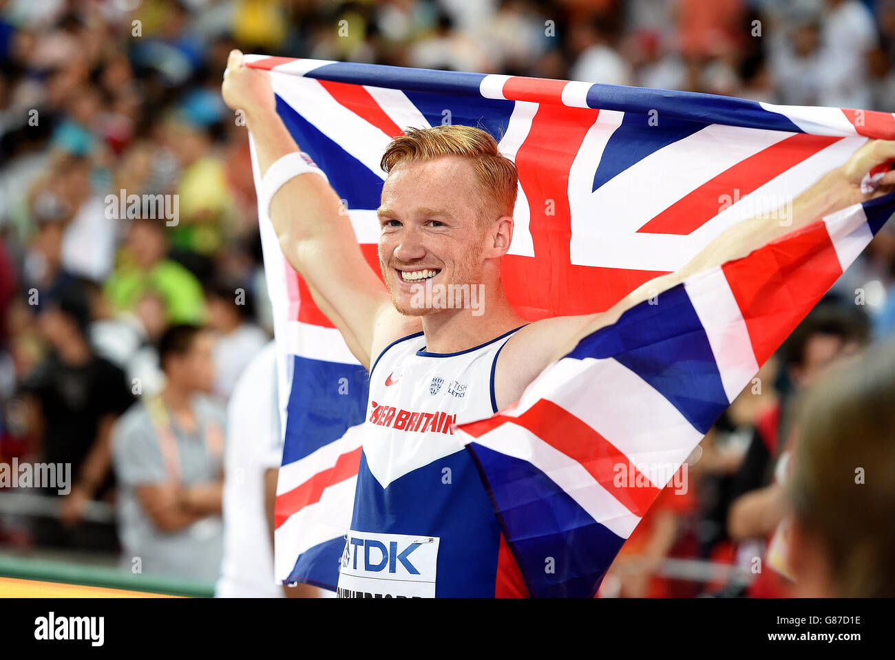 Great Britain's Greg Rutherford celebrates with a Union Jack flag after ...