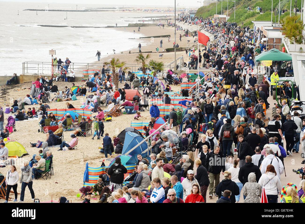 Spectators on the beach at Clacton-on-Sea, where large crowds have ...