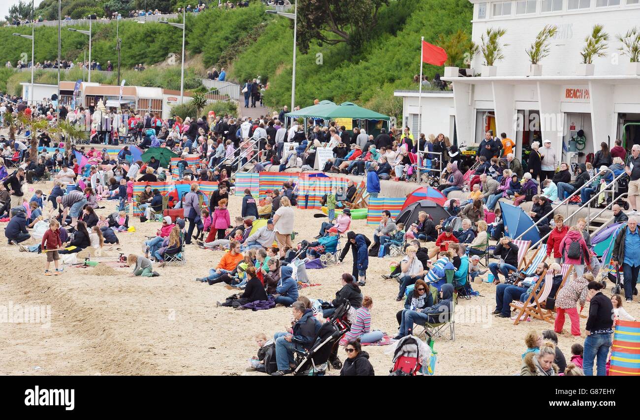 Spectators on the beach at Clacton-on-Sea, where large crowds have ...