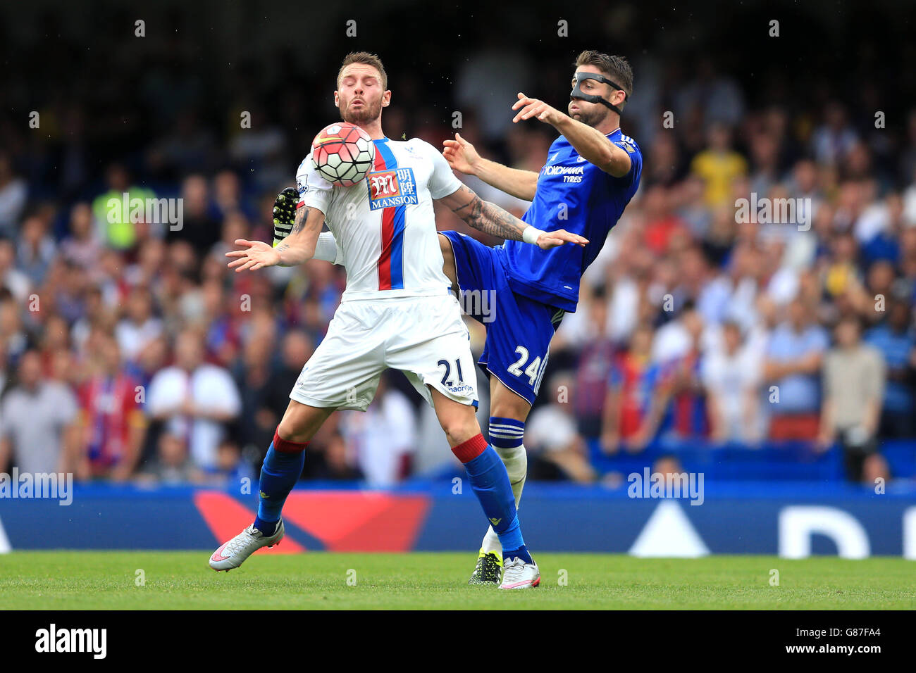 Chelsea's Gary Cahill (right) and Crystal Palace's Connor Wickham ...