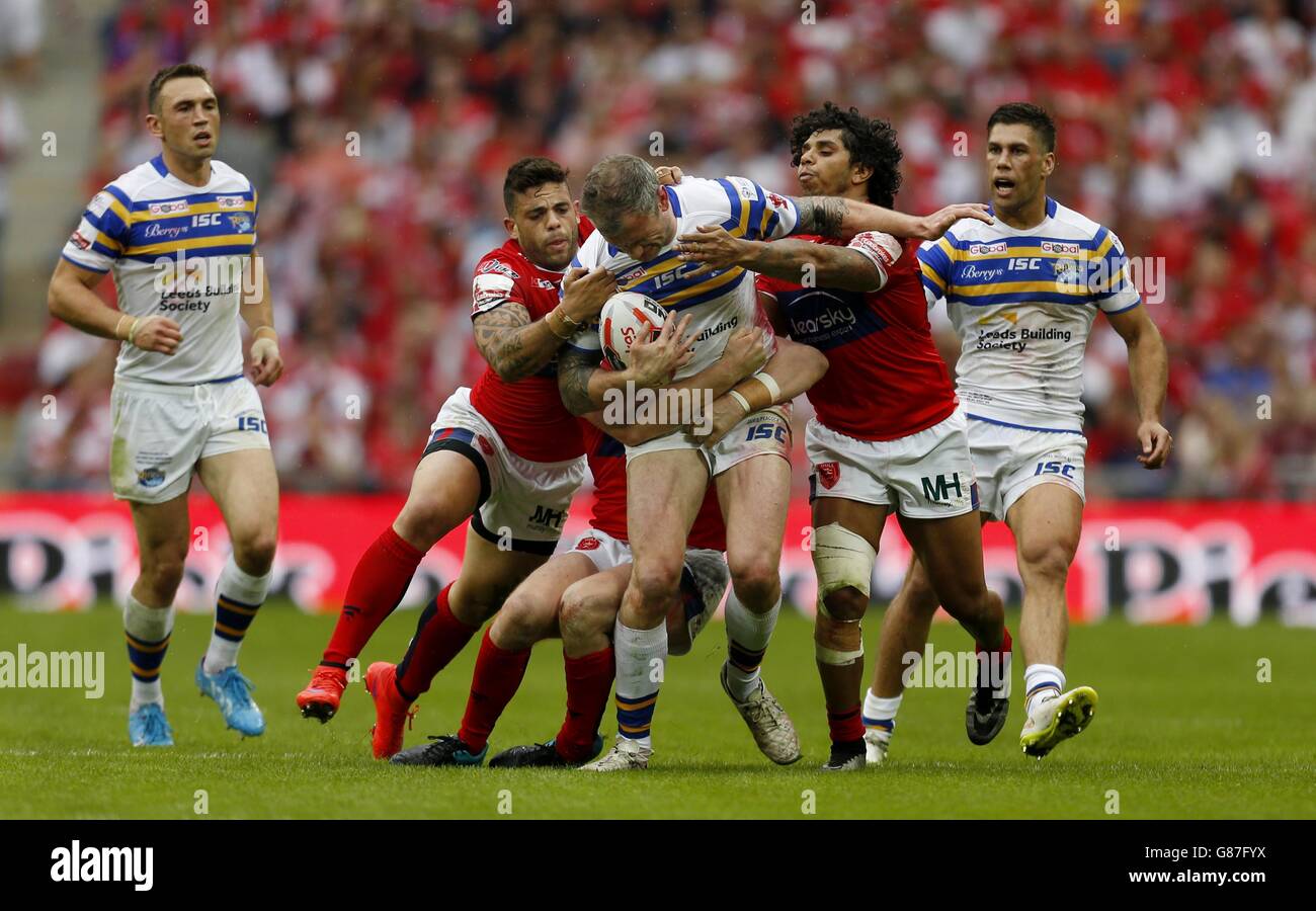 Leeds Rhinos' Jamie Peacock and Hull Kingston Rovers' Albert Kelly ...