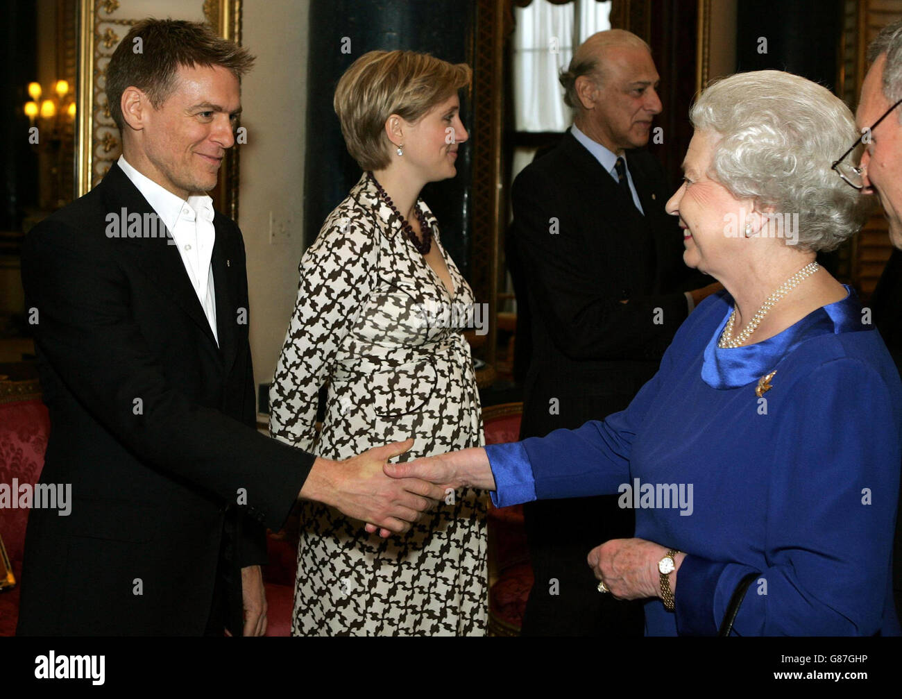 Queen Elizabeth II meets singer and guitarist Bryan Adams Stock Photo ...