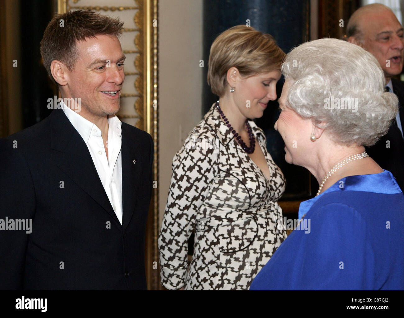 Queen elizabeth ii meets singer and guitarist bryan adams hi-res stock ...