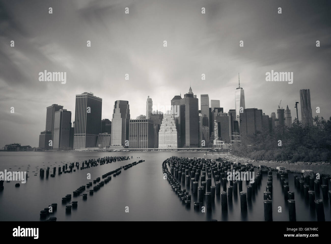 Downtown Manhattan skyline with pier wood log in New York City Stock ...