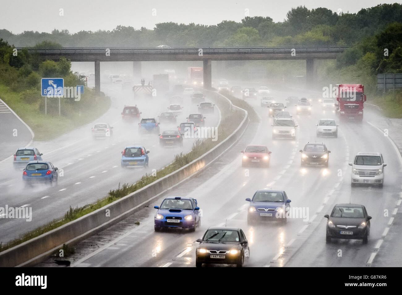 Traffic and heavy spray on the M5 Motorway in Somerset, where rain ...