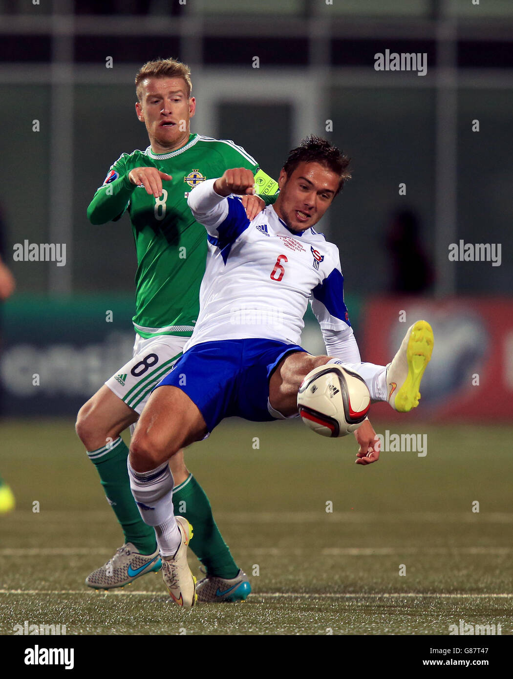 Northern Ireland's Steven Davis (left) and Faroe Islands' Hallur ...