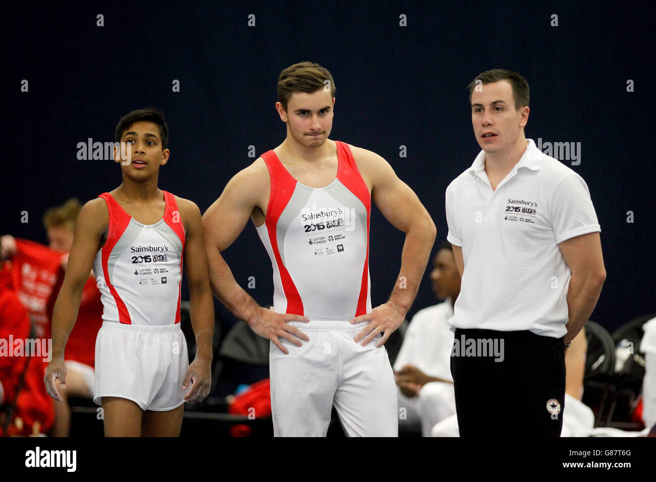 England's Tom Nicolaou and Joshua Nathan with coach during the ...