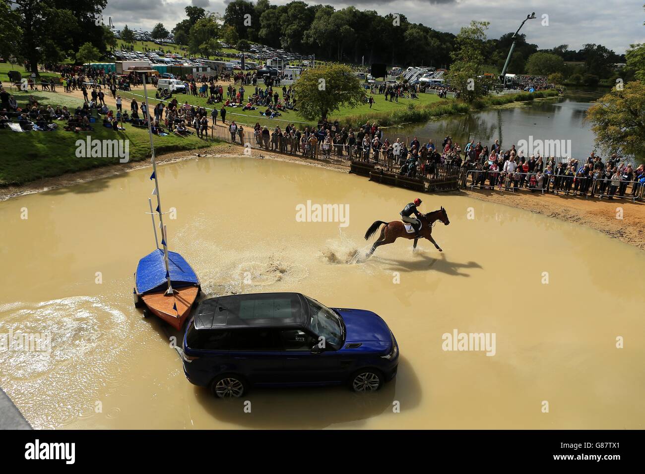 Matthew Heath of Great Britain riding The Lion jumps in the cross ...
