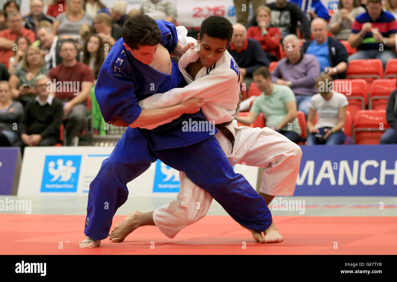 Scotland's Harry Mustard (blue) and Christopher Kumesu-Egru (white ...