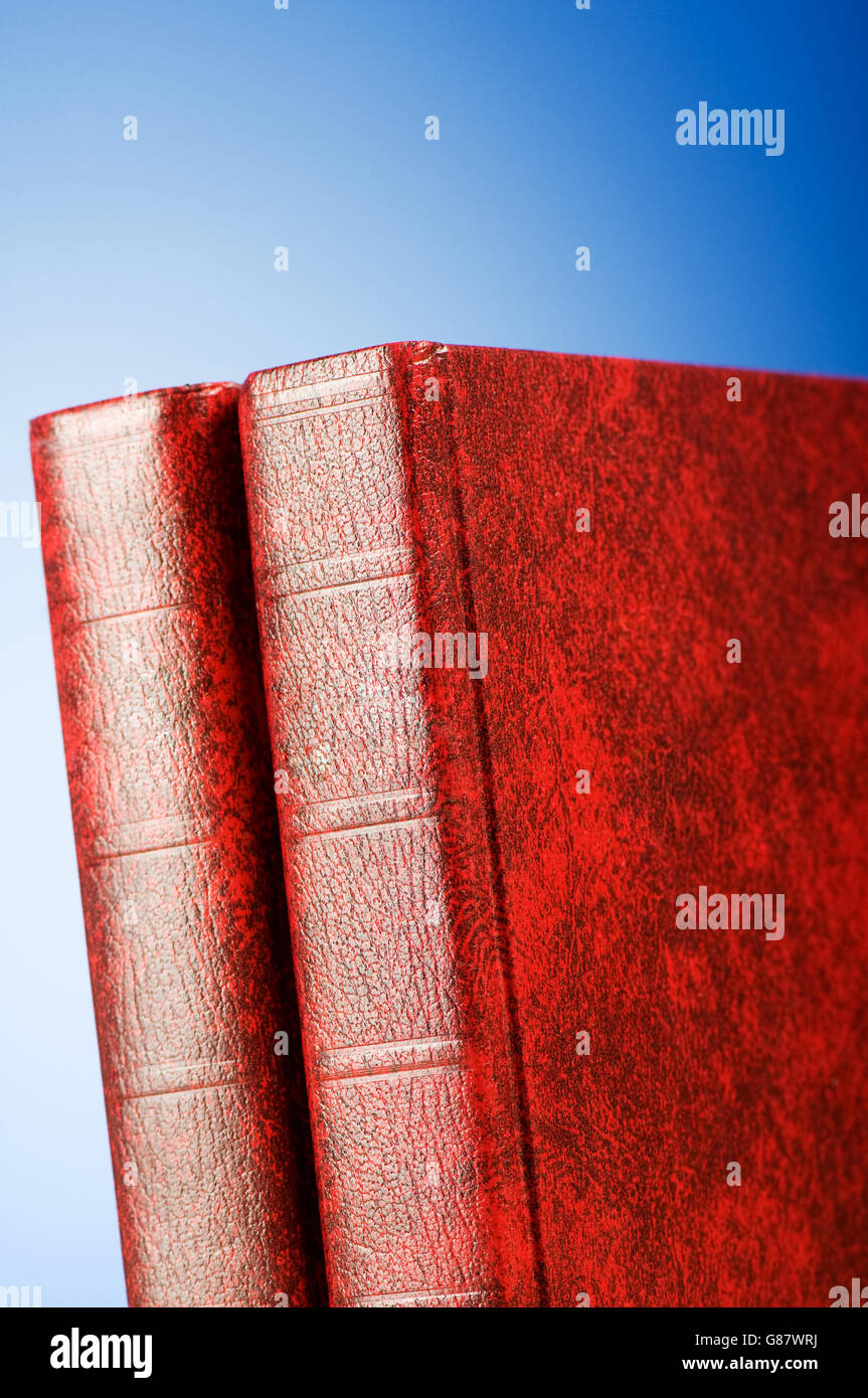 Education concept with red cover books Stock Photo - Alamy