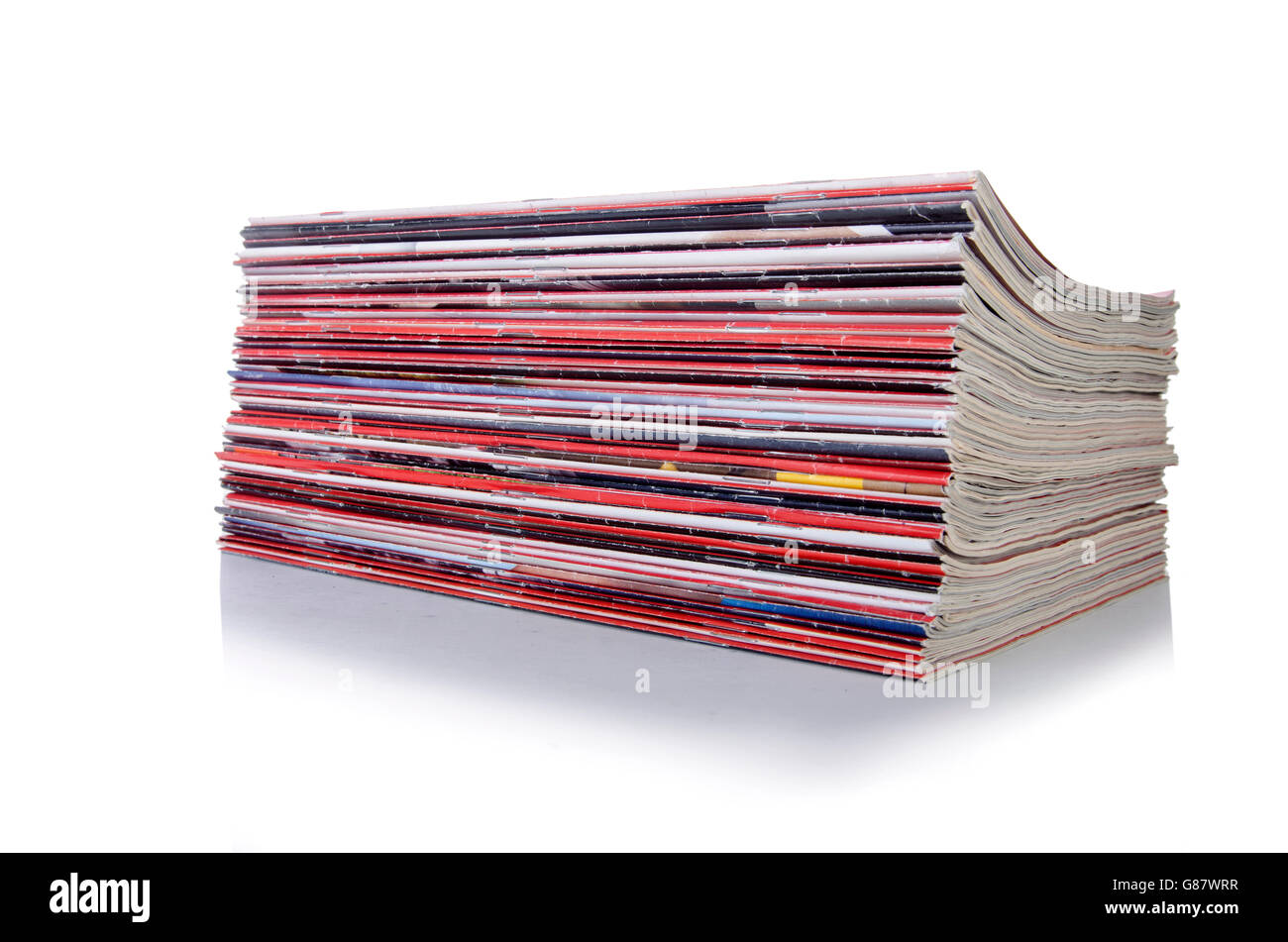 Stack of magazine isolated on the white background Stock Photo - Alamy