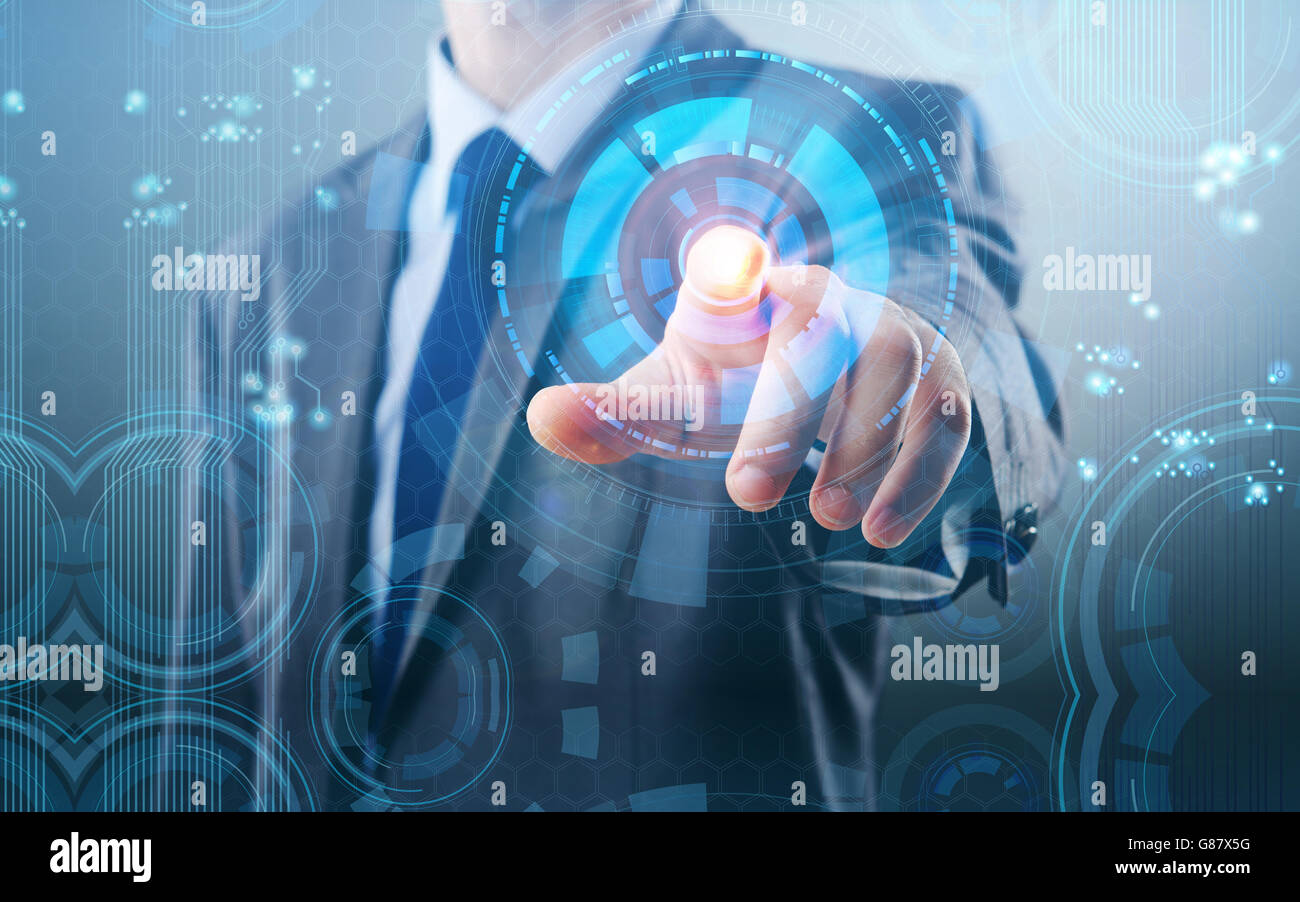 Businessman pressing virtual buttons in futuristic concept Stock Photo ...