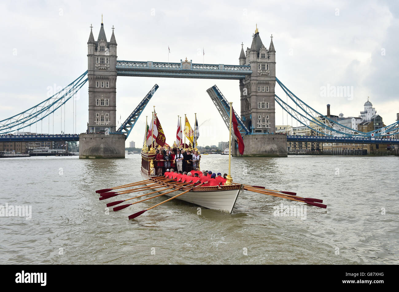 A Royal River Salute sails under Tower Bridge in London to celebrate ...
