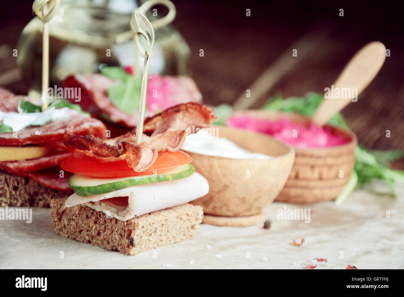 Tasty homemade tapas with different fillings on the table Stock Photo ...