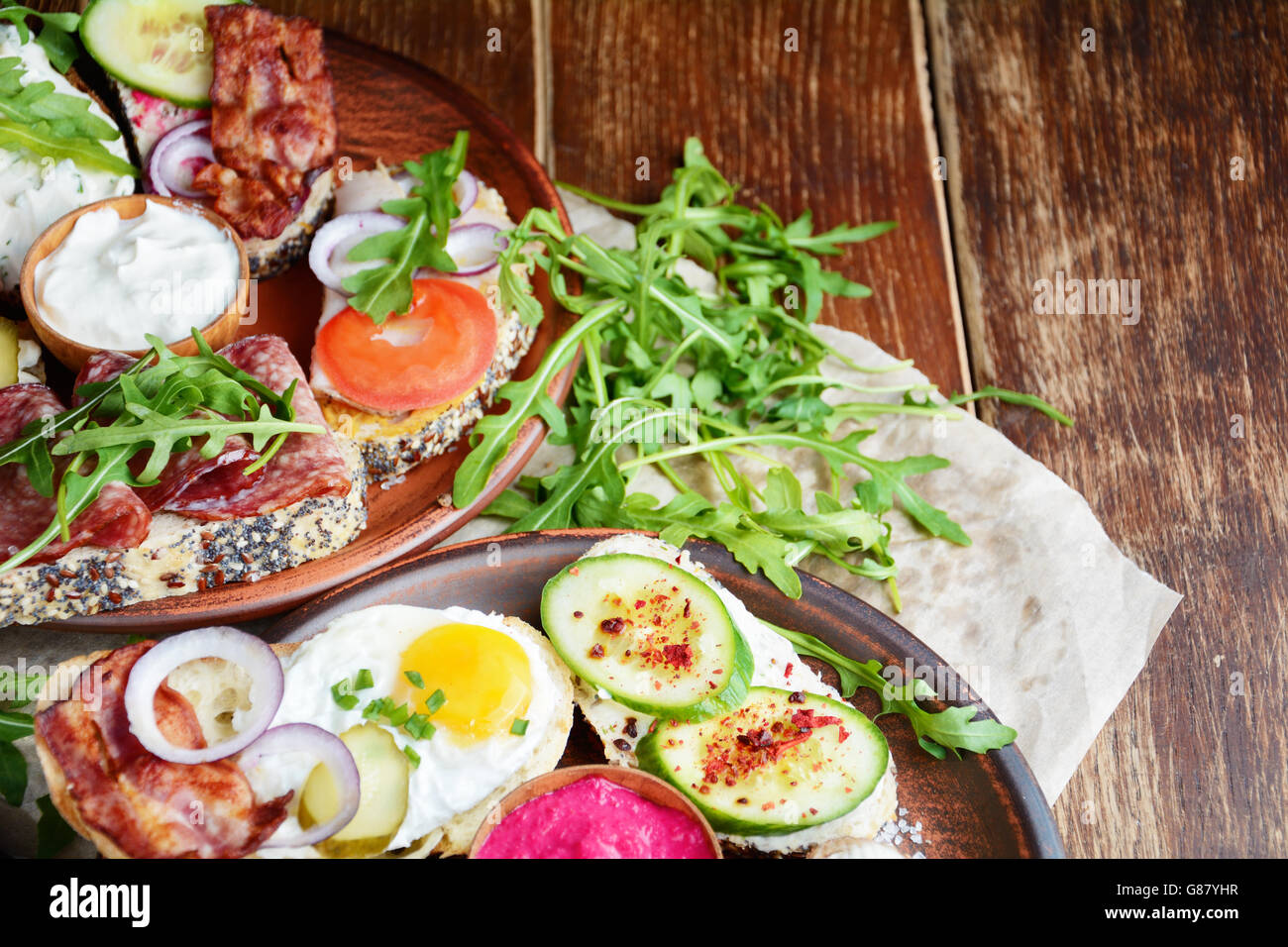 Tasty homemade tapas with different fillings on the table Stock Photo ...