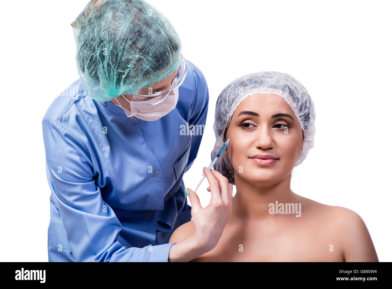Young woman preparing for plastic surgery isolated on white Stock Photo ...