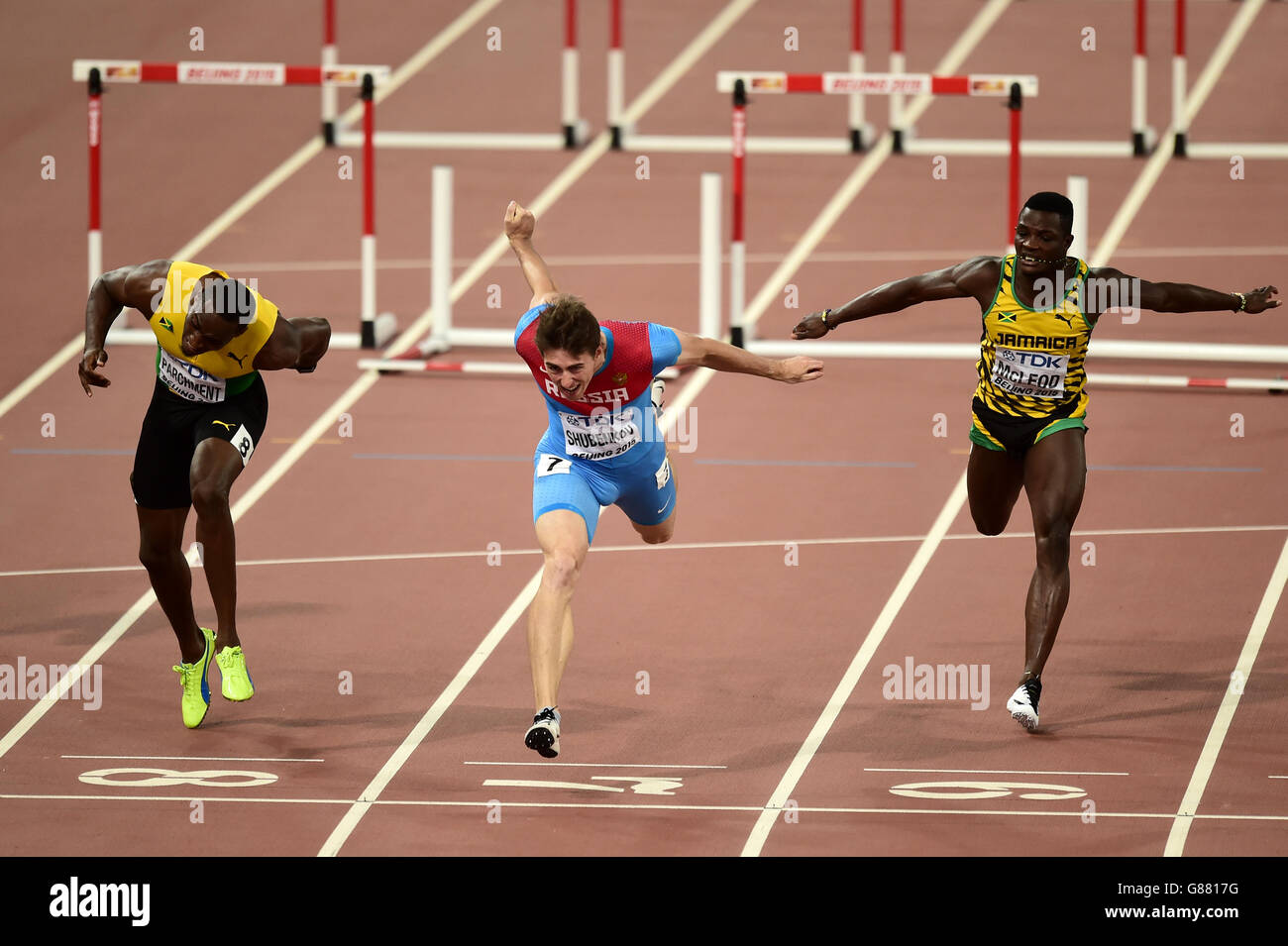 Russia's Sergey Shubenkov (second right) crosses the line to win the ...