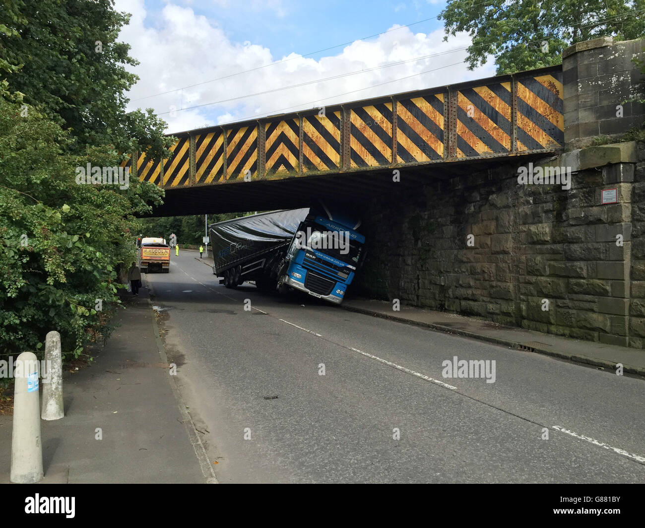 A lorry stuck in Milngavie near Glasgow after the driver attempted to ...