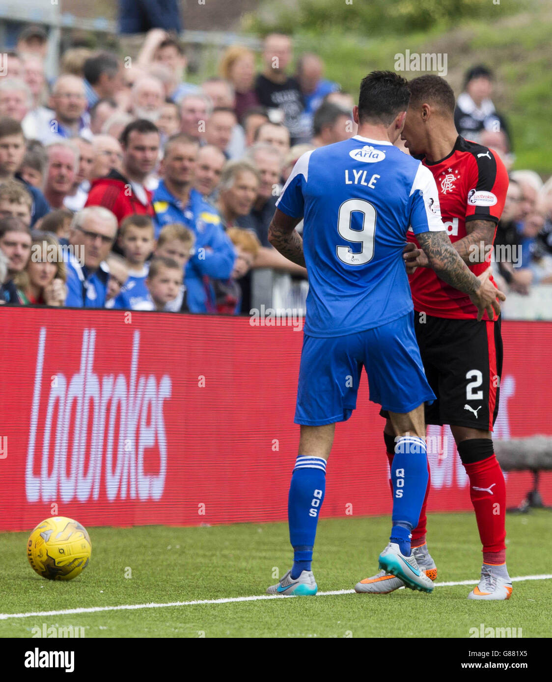 Queen of the South's Derek Lyle and Rangers' James Tavernier before ...