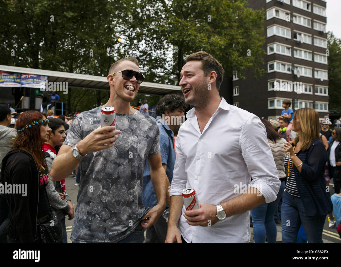 Carnival-goers enjoy the music and parade at Notting Hill Carnival in ...