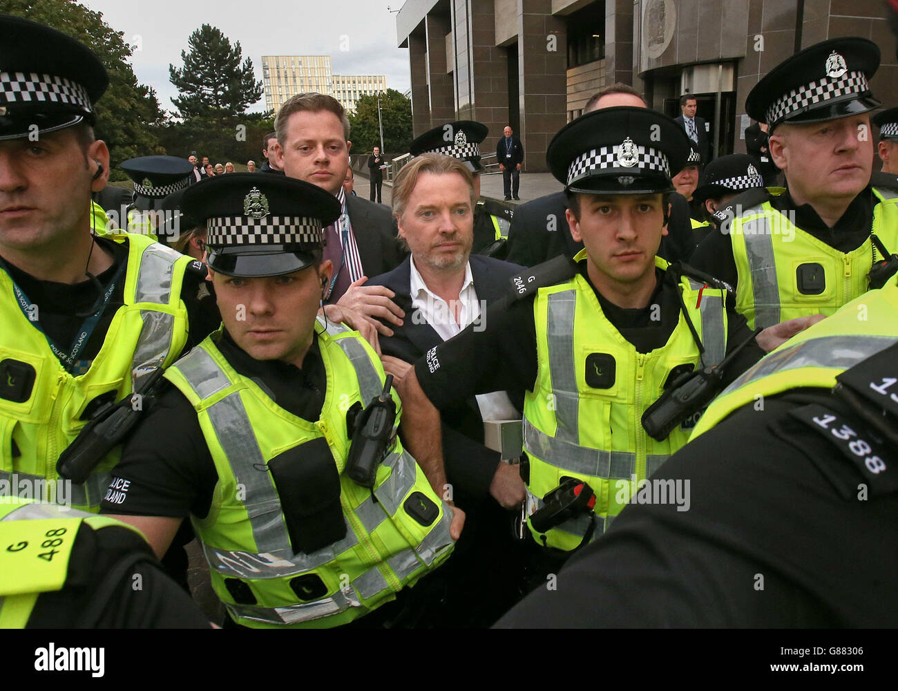 Former owner of Glasgow Rangers, Craig Whyte (centre) leaves Glasgow ...