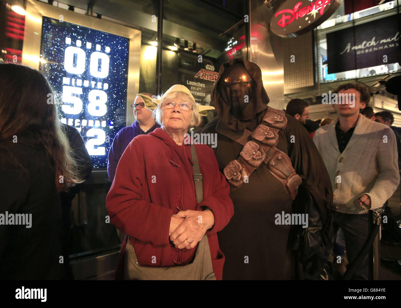 People wait for midnight at the Disney store in London for Star Wars ...