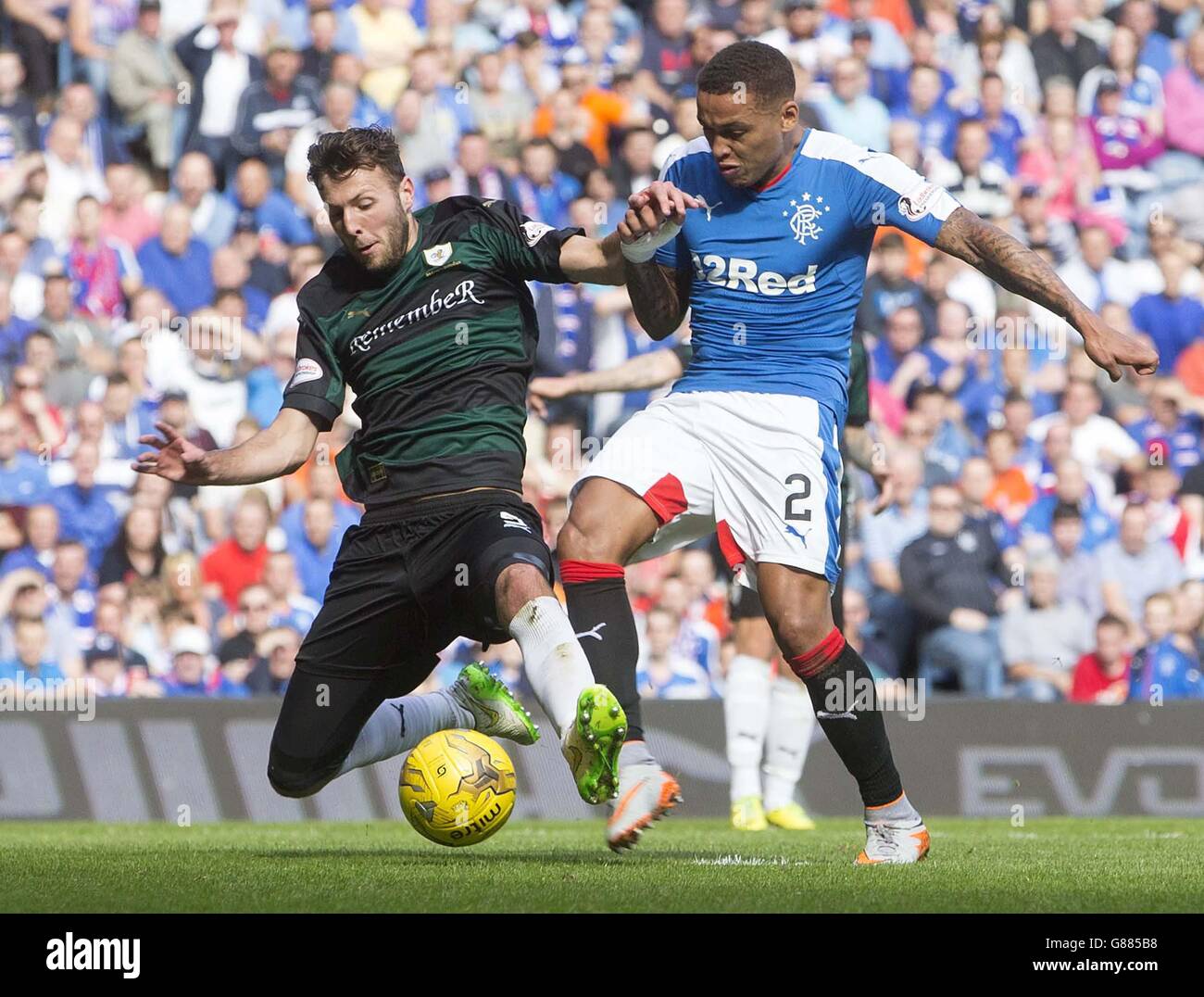 Rangers' James Tavernier (right) and Raith Rovers Lewis Toshney (left ...