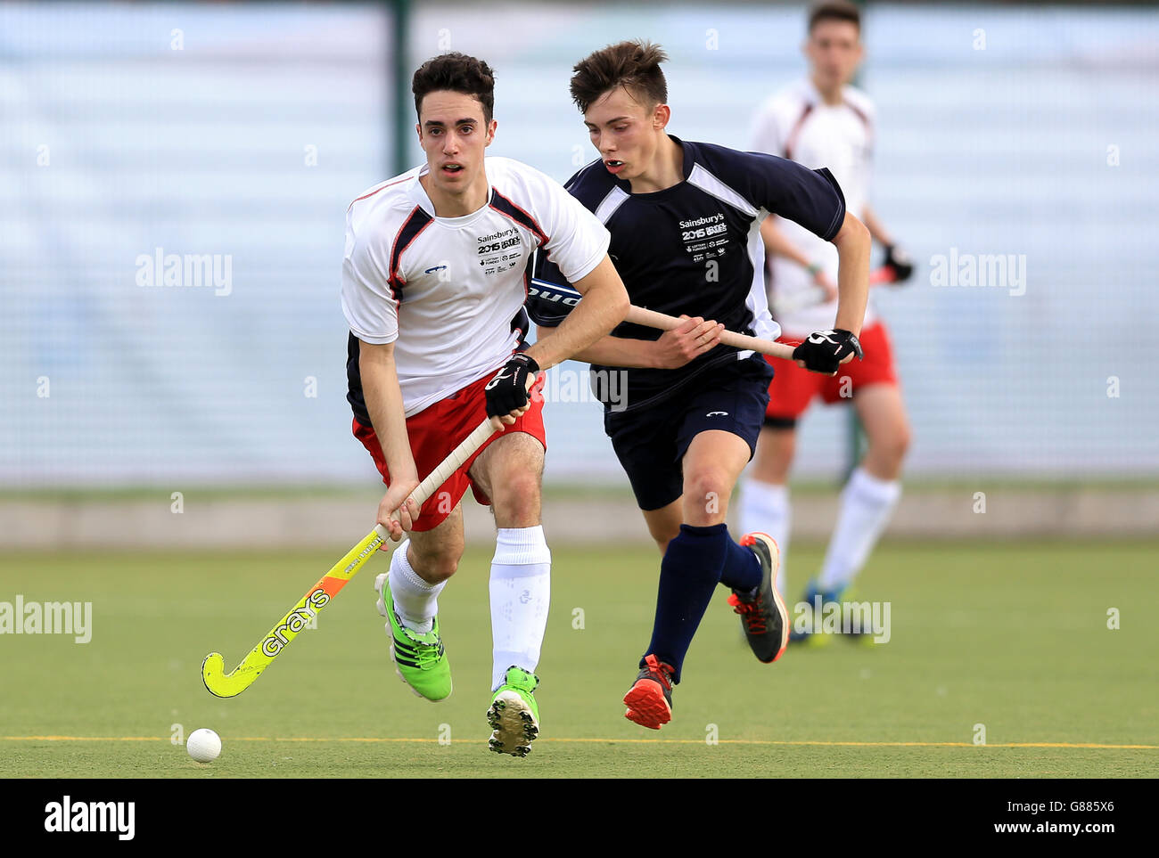 England Blue Boys Evan Kimber (white) in action against Scotland during ...