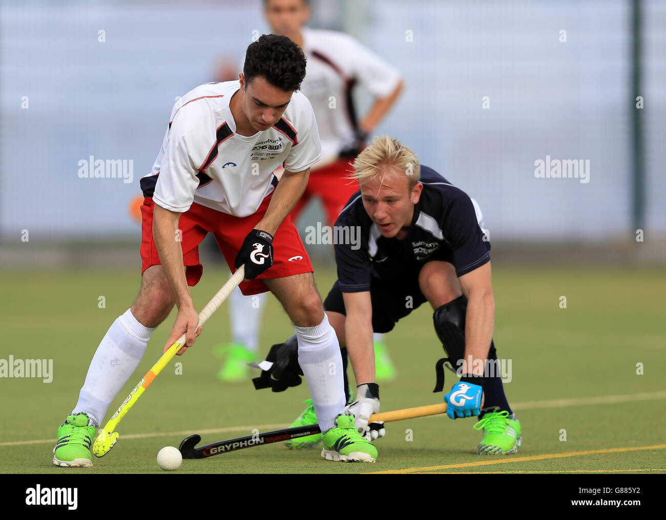 England Blue Boys Evan Kimber (white) in action against Scotland during ...